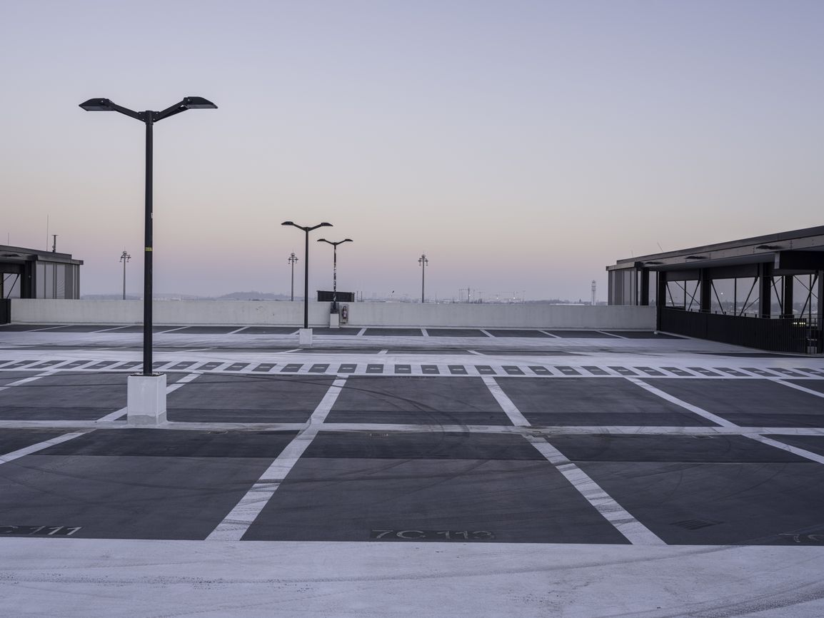 Daytime Architecture: Street Light on Road Surface