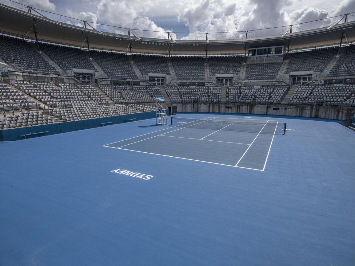 Open Space Tennis Court Under an Azure Sky