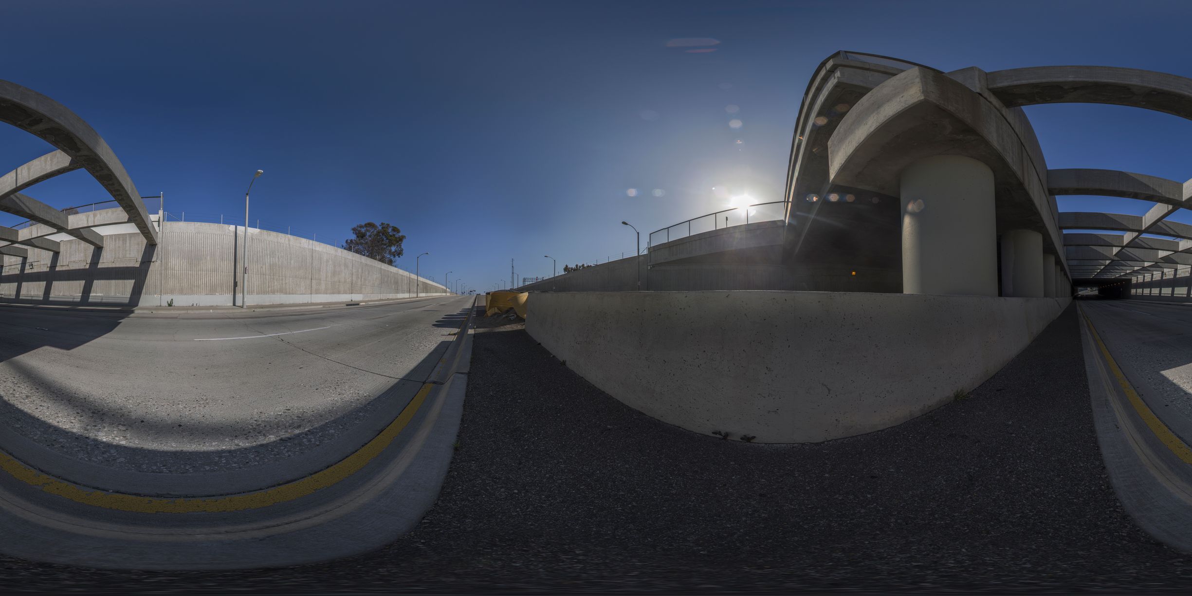 Skateboarder on Concrete Ramp in California, USA