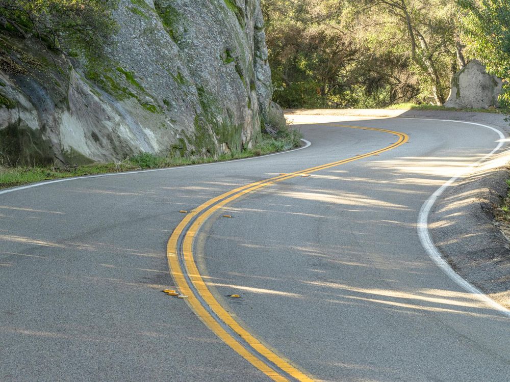 Asphalt Road Curving Rock Wall - HDRi Maps and Backplates