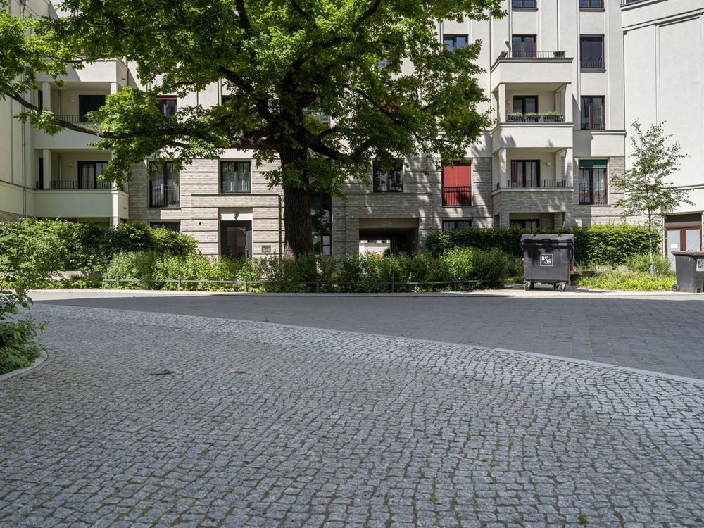 Residential Area in Berlin: Traditional Cobblestone Roads and Modern ...