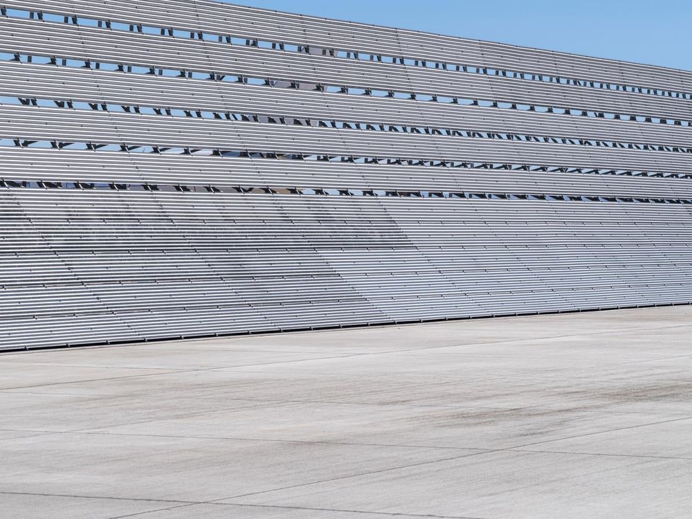 Concrete Building with Vertical Walls and Floors, Clear Sky