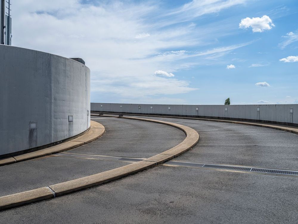 Curved Road to City Parking Garage