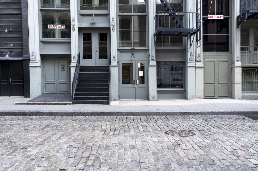 Fire Hydrant outside Glass Building in New York City