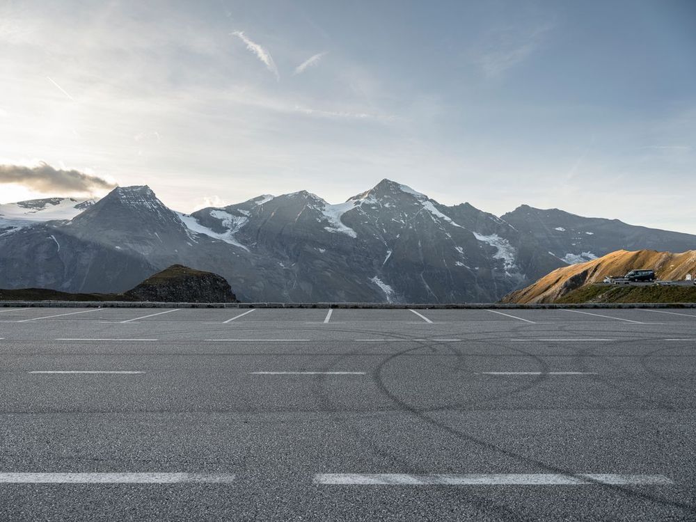 Empty Parking Lot With Mountain View