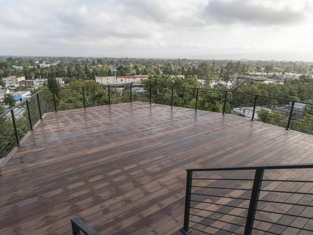 Residential Terrace Overlooking Los Angeles Skyline with Wooden Deck ...