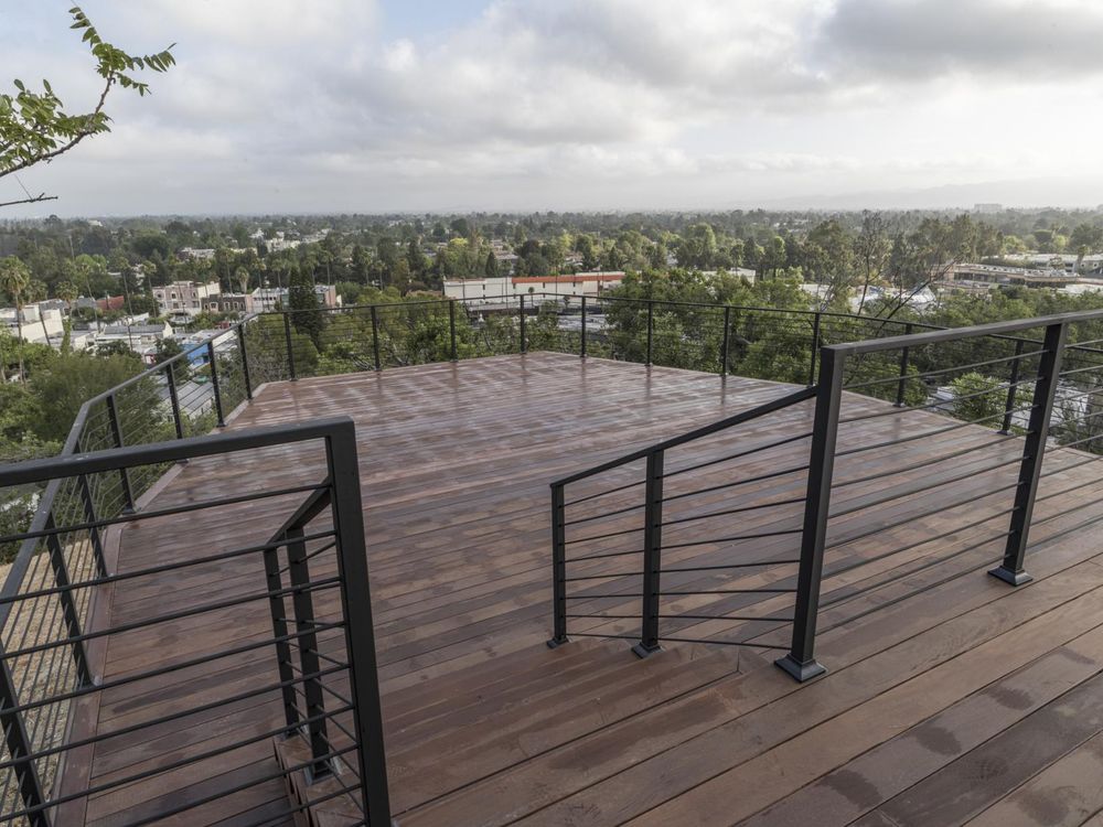 Residential Terrace Overlooking Los Angeles Skyline with Wooden Deck ...