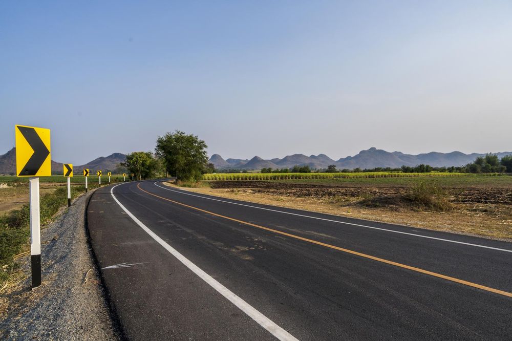 Scenic Road Sign with Stunning Mountain View - HDRi Maps and Backplates