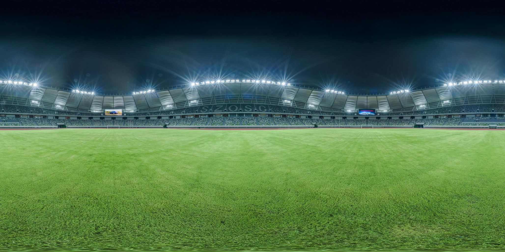 Empty Stadium in China: A Green Baseball Field Illuminated by Lights ...