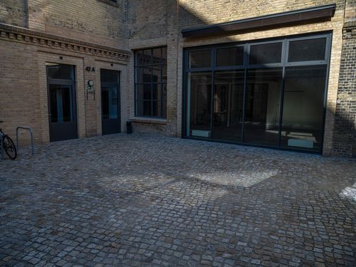 Historic Warehouse in Berlin: Cobblestone Courtyard and Classic ...