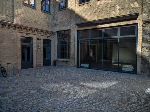 Historic Warehouse in Berlin: Cobblestone Courtyard and Classic ...