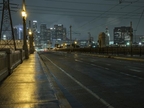 Nighttime in Los Angeles: Cityscape with Rainy Streets and Bright ...