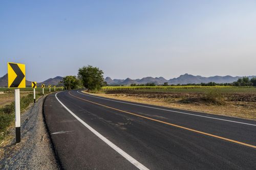 Scenic Road Sign with Stunning Mountain View - HDRi Maps and Backplates