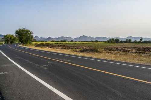 Scenic Road Sign with Stunning Mountain View - HDRi Maps and Backplates