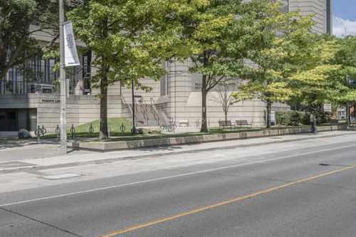 Street View in Toronto Canada with Parking Meters and Trees