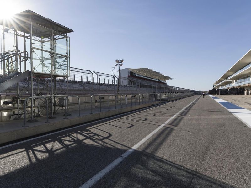 Aerial View of a Metropolitan Area with a Straight Road to the Race ...