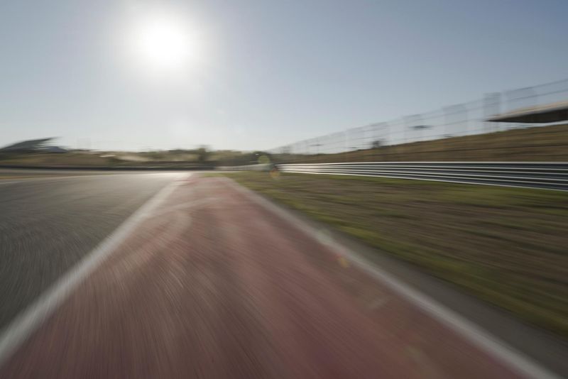 Asphalt Race Track with Red Stadium HDRi Maps and Backplates