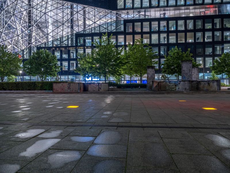 Berlin's Business District at Night: Neon Lights Illuminate the City ...