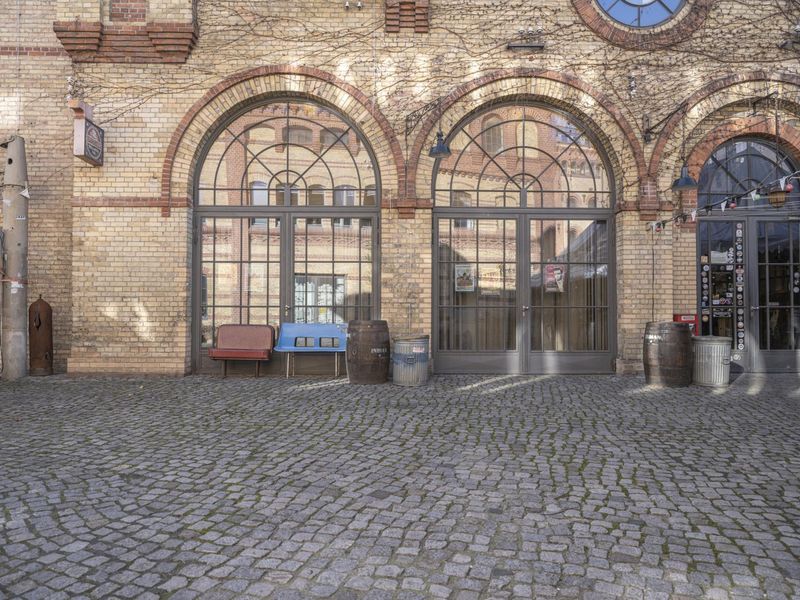 Berlin City Architecture: Large Building with Doors and Glass Windows ...