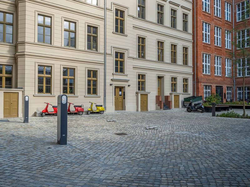 Berlin's Cozy Cobblestone Courtyard in a Residential Area