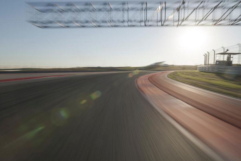 Car Racing on a Sunlit Race Track HDRi Maps and Backplates