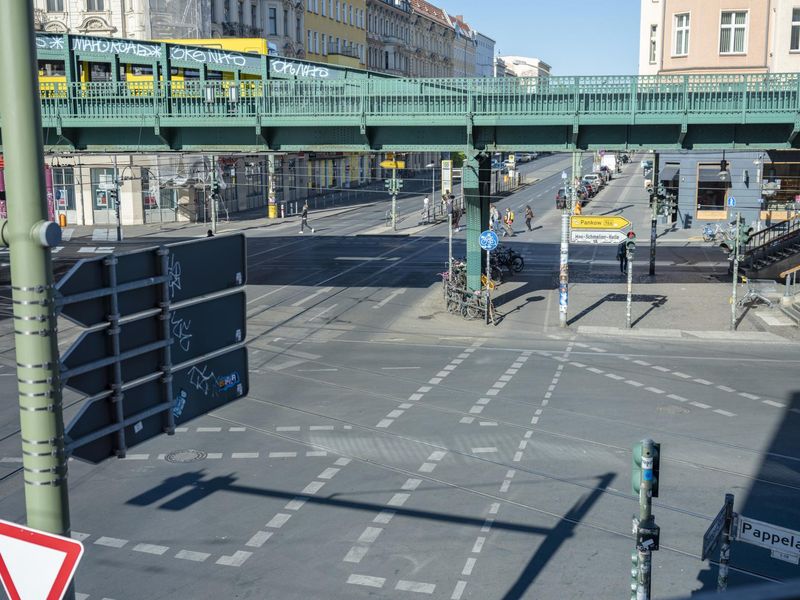 City Intersection with Cars, Pedestrian and Sign in Berlin, Germany ...