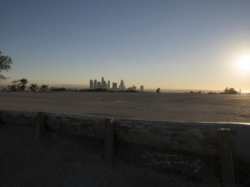 City Skyline at Sunset over Beachfront Parking Lot HDRi Maps and Backplates