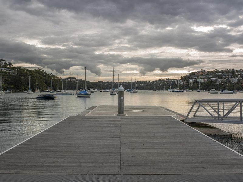 Coastal Dock with Boats on Water under Cloudy Sky HDRi Maps and Backplates