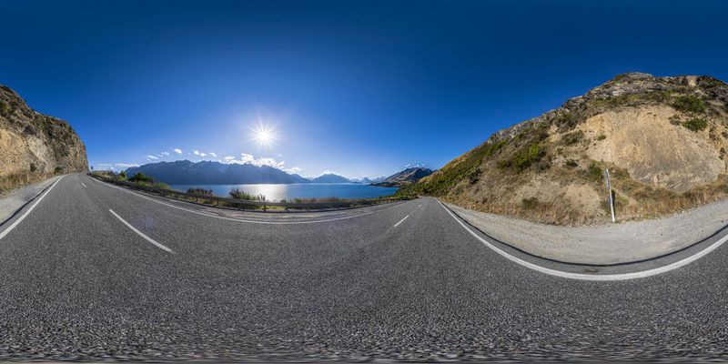Coastal Road with Mountain View: A Distorted Image HDRi Maps and Backplates