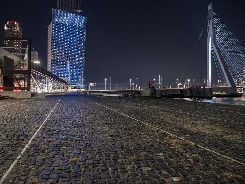 Cobblestone Streets During Night City Lights