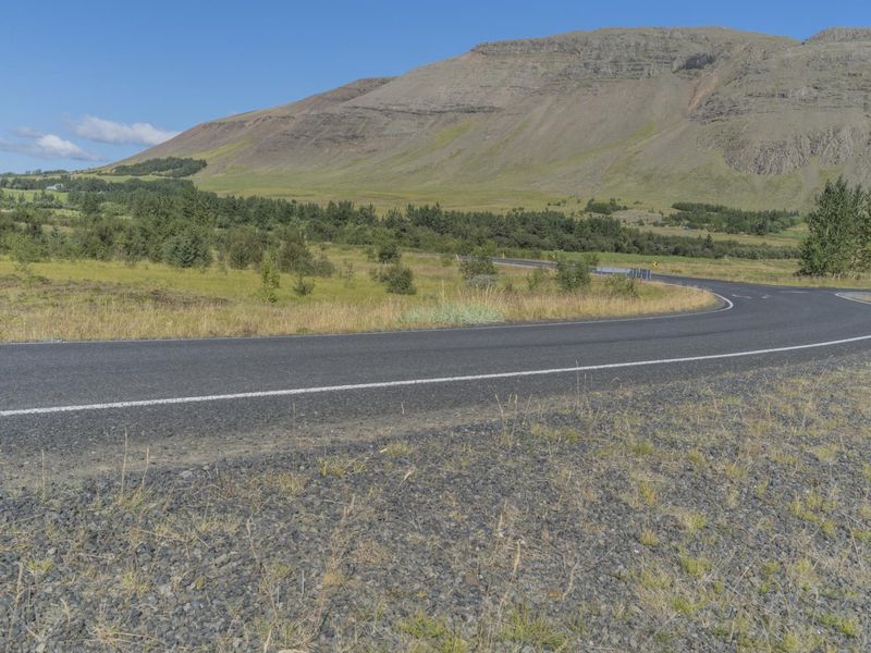 Curved Highway through Iceland Mountain Greenery HDRi Maps and Backplates