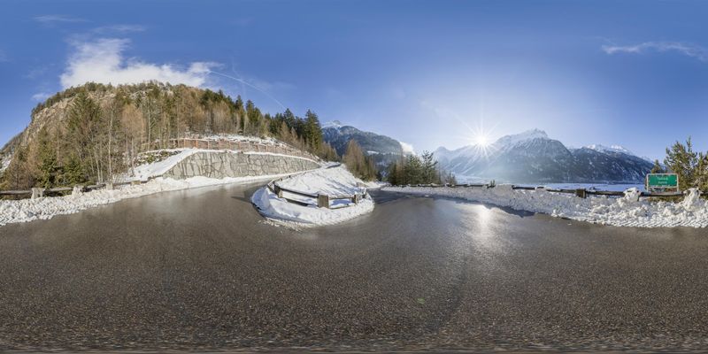 Curved Road in the Snow: Exploring the Swiss Alps HDRi Maps and Backplates