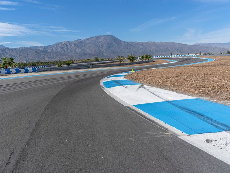 Curvy Asphalt Race Track on a Sunny Day HDRi Maps and Backplates
