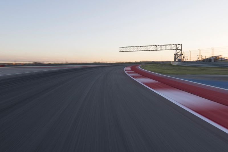 Dawn Automobile Racing on an Asphalt Road HDRi Maps and Backplates