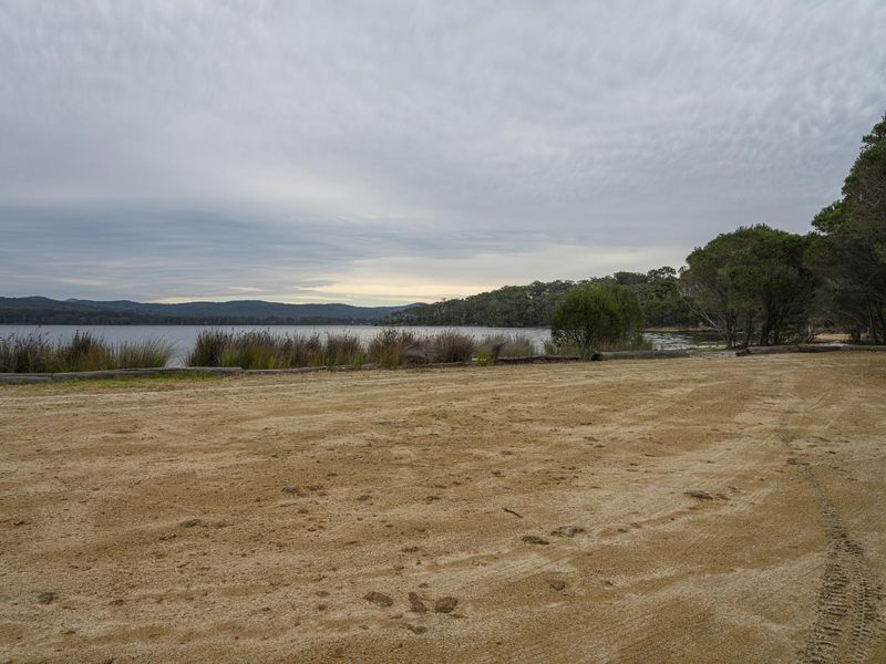 Empty Sandy Beach Overlooking Wallagoot Lake in New South Wales ...