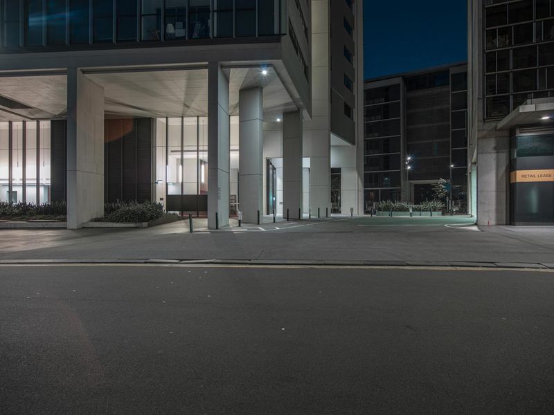 Empty Sidewalk by Glassy Building at Night HDRi Maps and Backplates