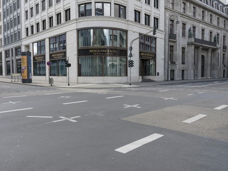 Empty Street in Cologne, Germany with Tall Modern Building and Signs on ...