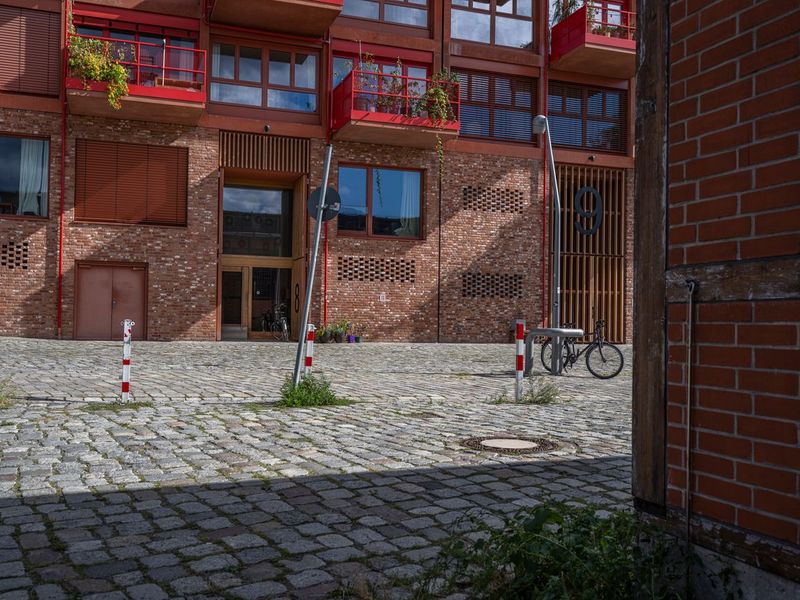 European Residential Area: Cobblestone Streets and Modern Architecture ...