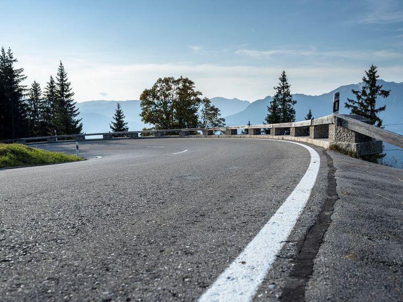 European Road: Asphalt Curves Through Nature HDRi Maps and Backplates