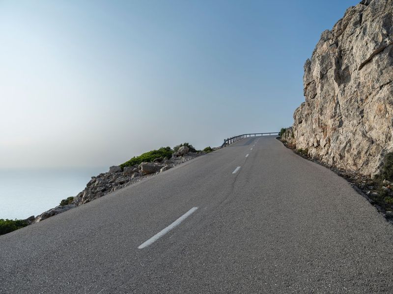 Exploring Majorca: A Coastal Road beneath a Clear Sky HDRi Maps and ...