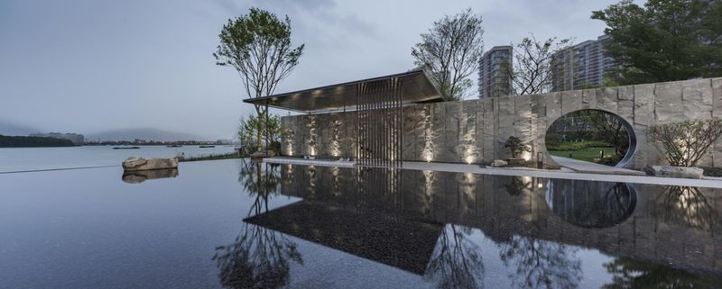 Cityscape at Dawn with Reflection on Water HDRi Maps and Backplates