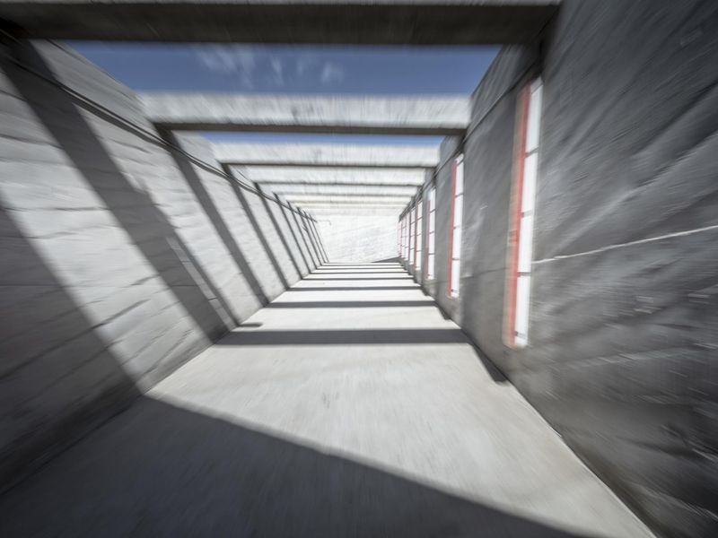 Futuristic Concrete Building: A Motion Blur Perspective