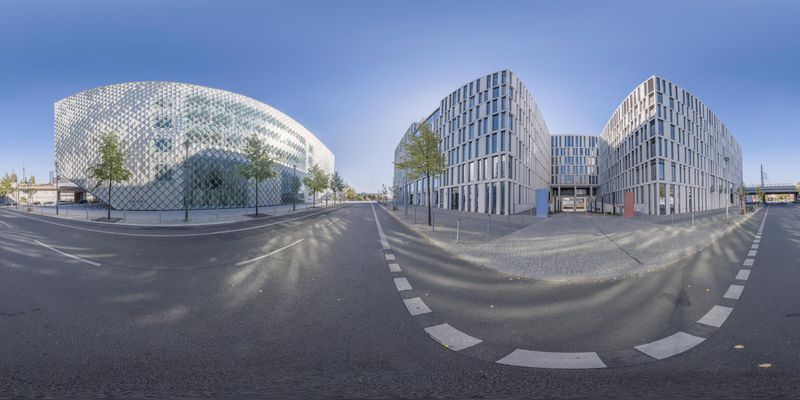 Glass Building in Berlin: A Futuristic Structure Surrounded by Greenery ...
