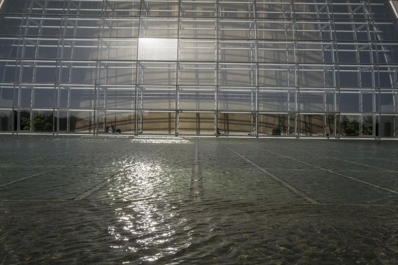 A Glass Wall with Urban Reflections in Beijing HDRi Maps and Backplates