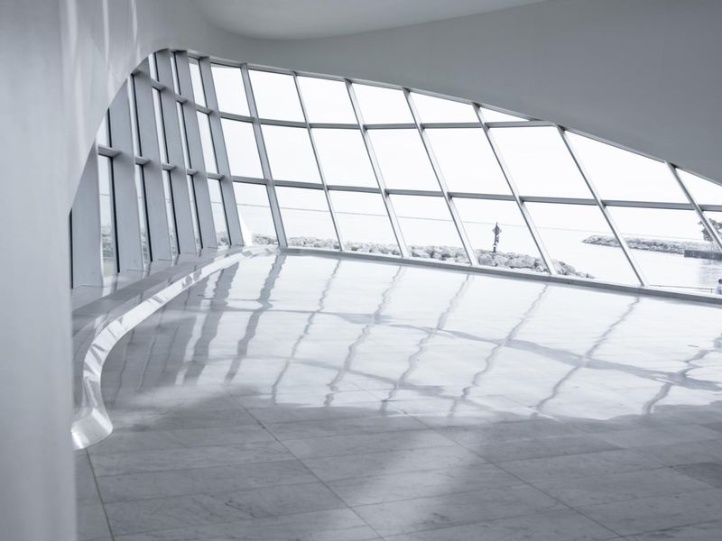 Modern Architecture Building with Windows overlooking Water in ...