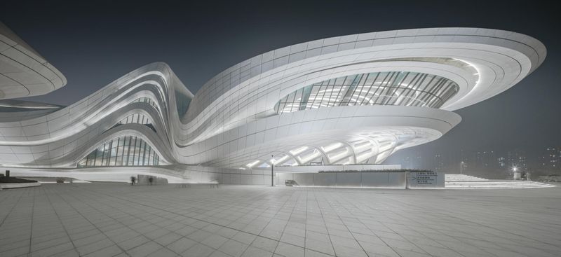 Night Illuminated Modern Building with Open Space Plaza in a City HDRi ...