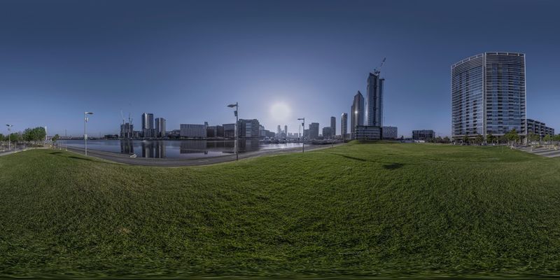 Modern City Skyline Along a Coastal Harbor HDRi Maps and Backplates
