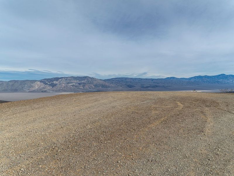 Motorcycle Ride in Dirt Field with Majestic Mountains HDRi Maps and ...