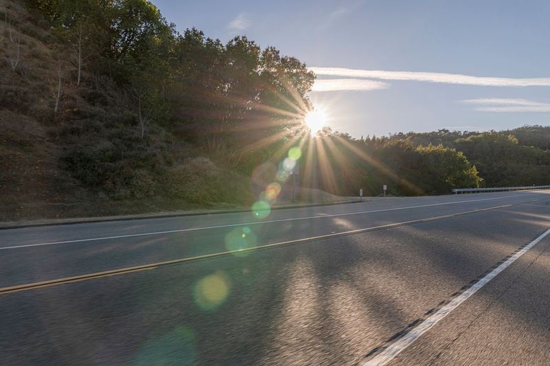 Motorcyclist on Road at Dawn with Sunlight HDRi Maps and Backplates