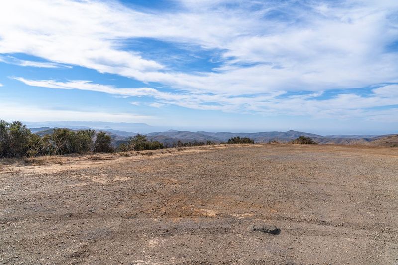 Mountain Overlook of Dirt Field with Trees and Clouds HDRi Maps and ...